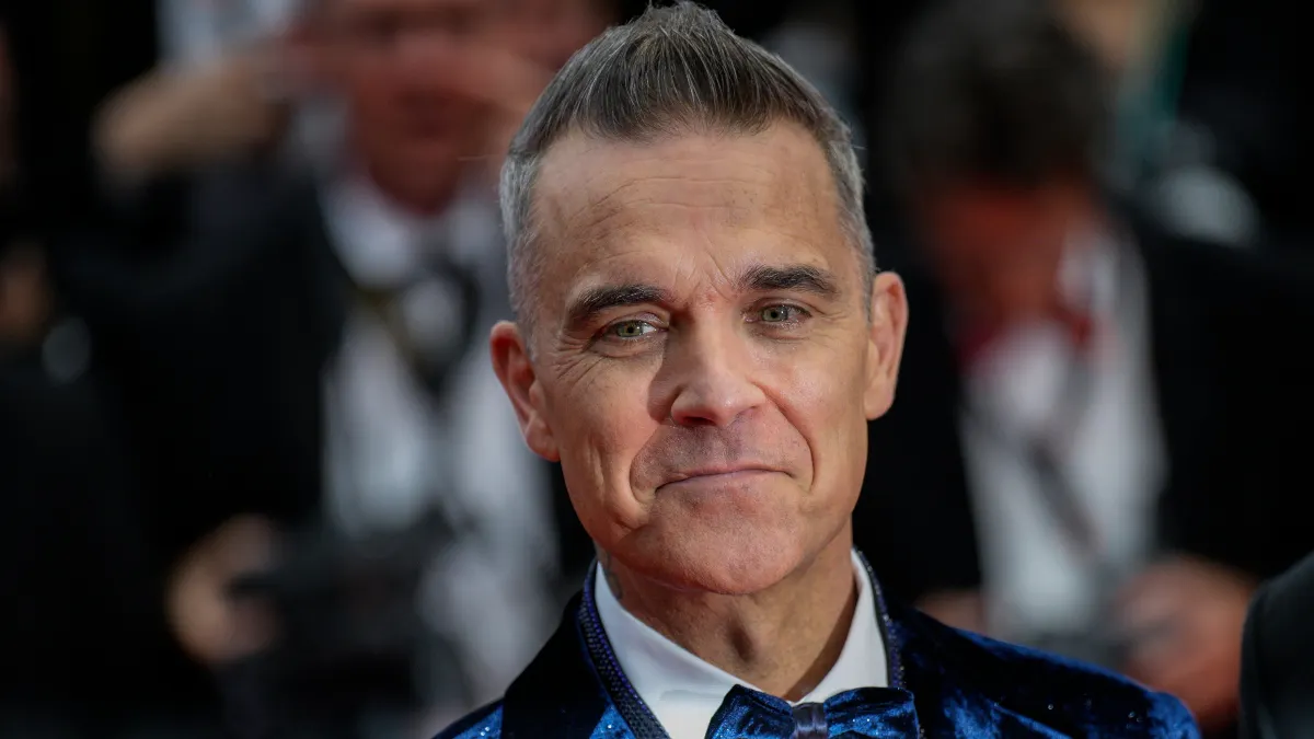 Vender han tilbage til Take That? Det siger Robbie Williams om ...