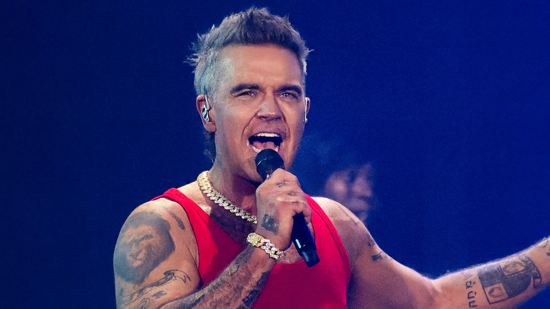 Kæmpe overraskelse under Robbie Williams-koncert: Pludselig stod de ...
